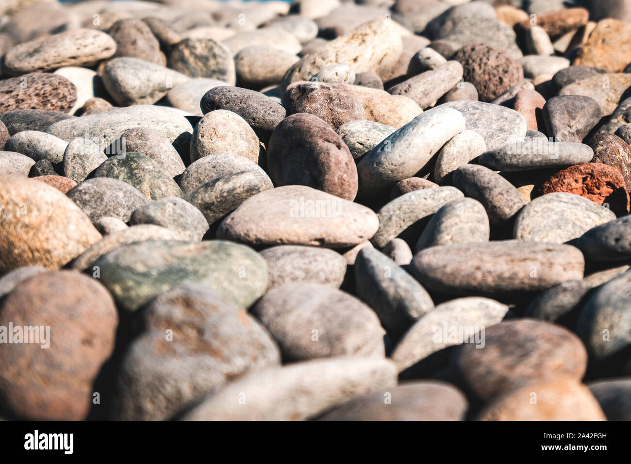 Beach with colored stones hi-res stock photography and images - Alamy