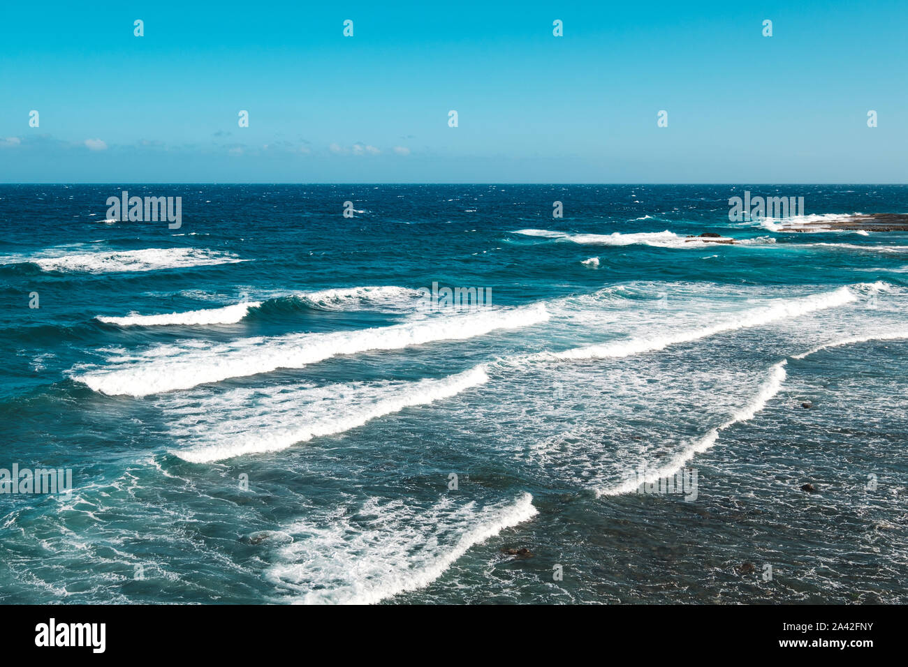 ocean landscape, sea waves on sunny day with blue sky Stock Photo - Alamy