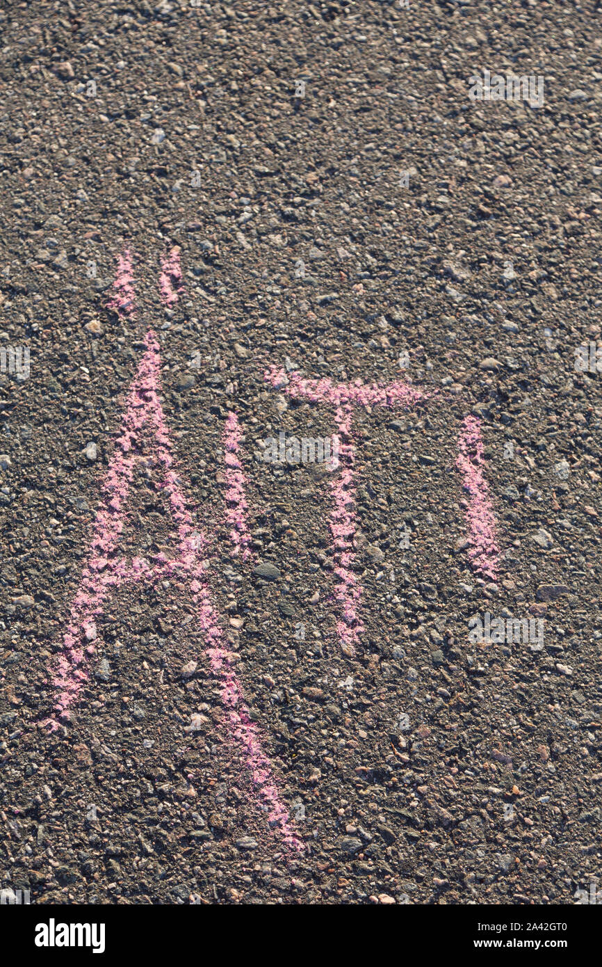 Chalk drawing or text in a asphalt Stock Photo - Alamy