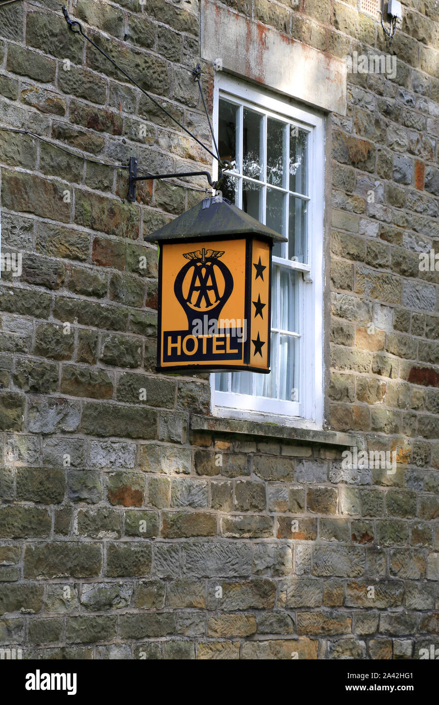 Old AA sign outside country hotel, High Street, Lastingham, York, North ...