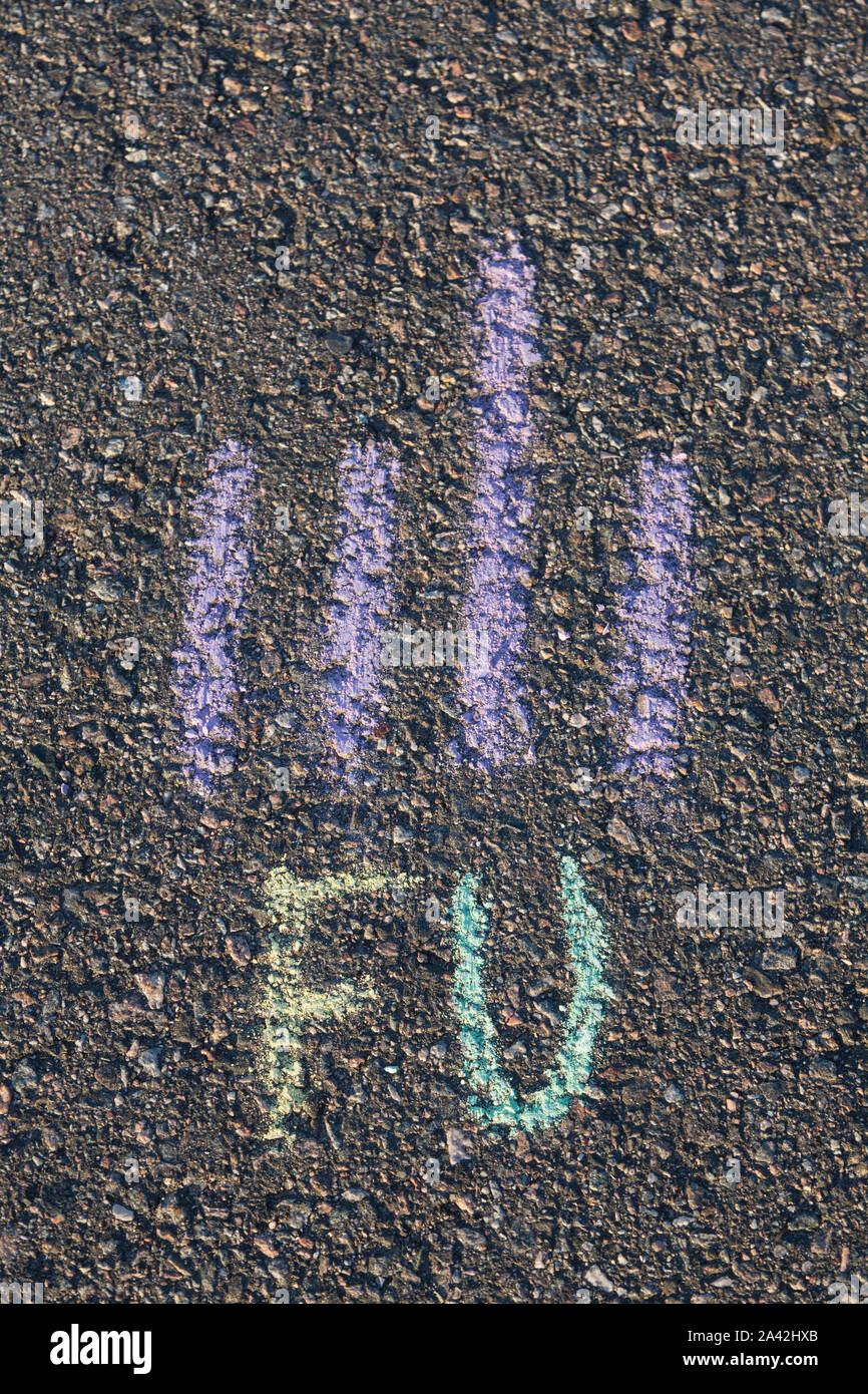 Chalk drawing or text in a asphalt Stock Photo - Alamy