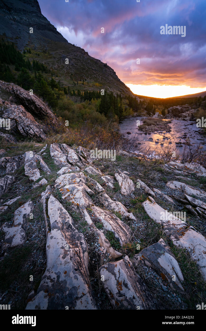 Landscape of a rock formation just beside Swiftcurrent alke with the ...