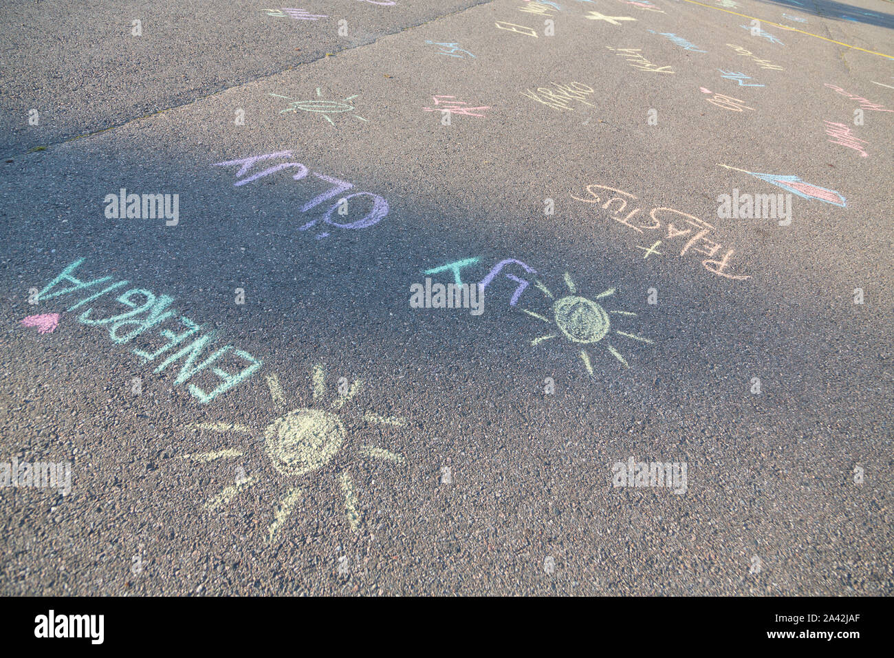 Chalk drawing or text in a asphalt Stock Photo - Alamy