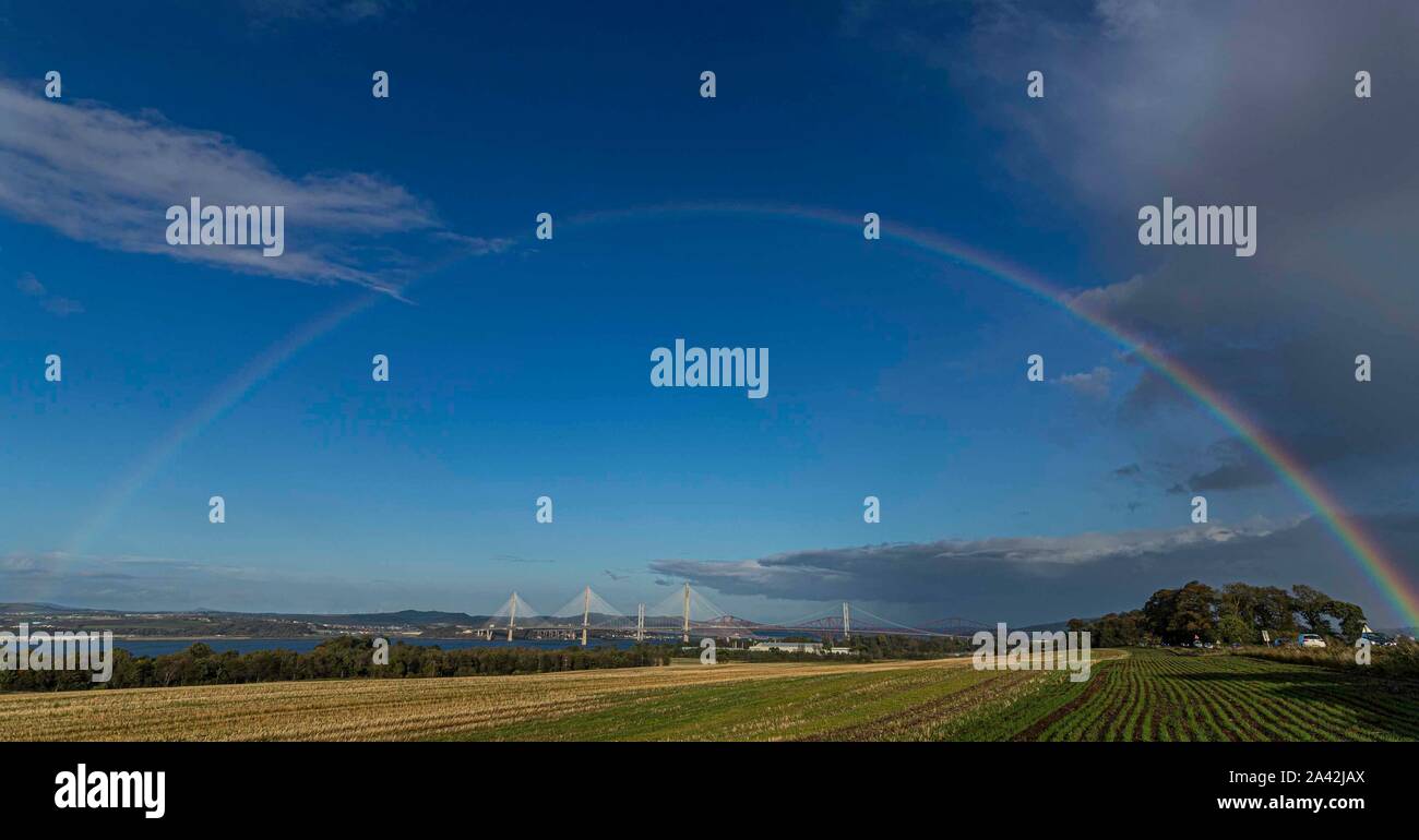 Edinburgh, United Kingdom. 11 October, 2019 Pictured: A rainbow arches ...
