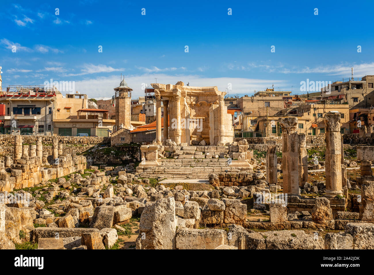 The ruins and only fragment of Venus temple left with modern houses and ...