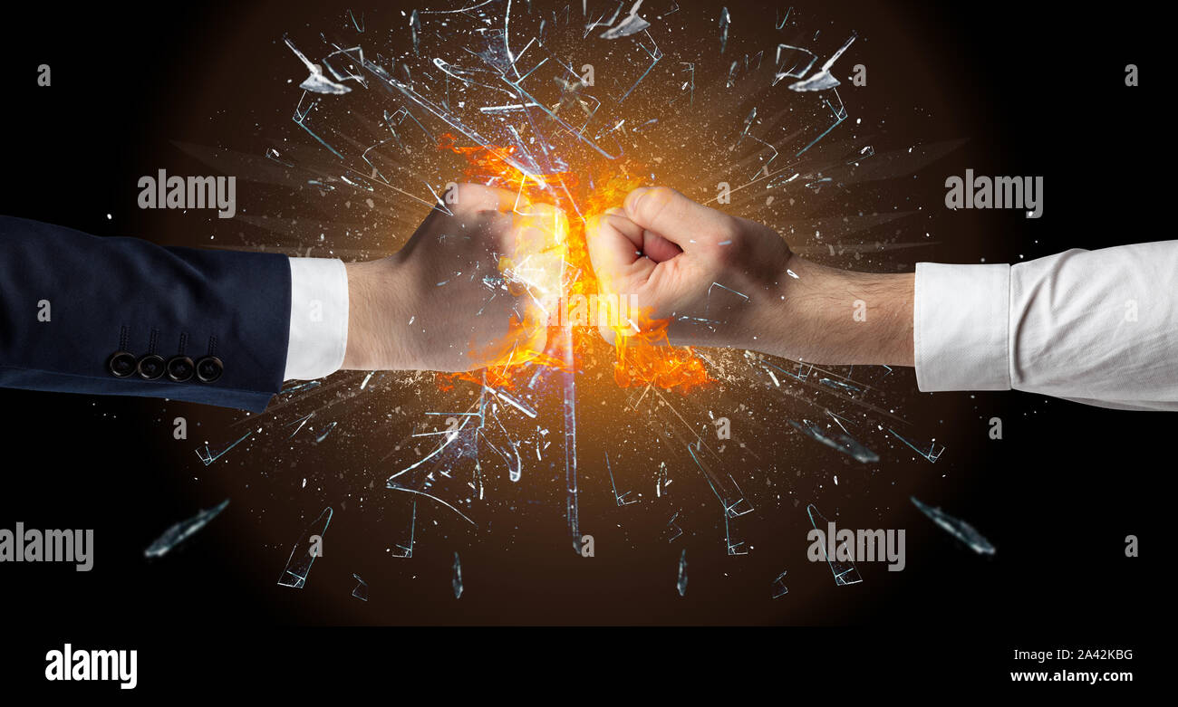 Two hands fighting and breaking a glass into small pieces Stock Photo ...