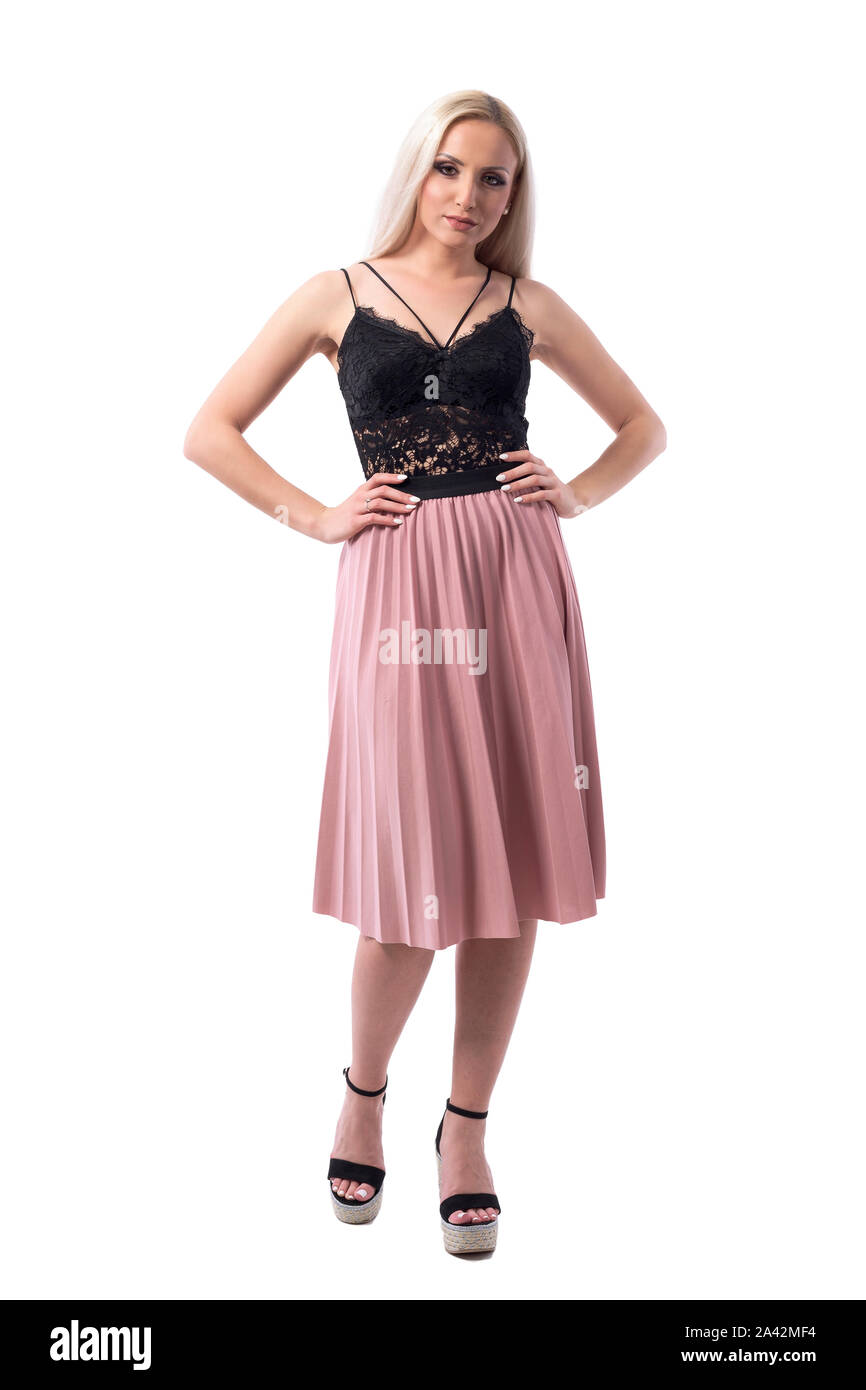 Bossy displeased young woman with attitude and style holding hands on ...