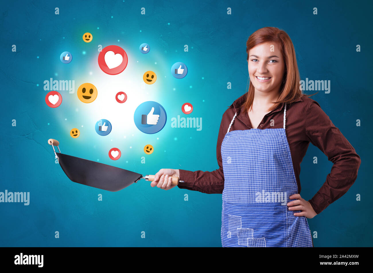 Young happy person cooking social media concept in wok Stock Photo - Alamy