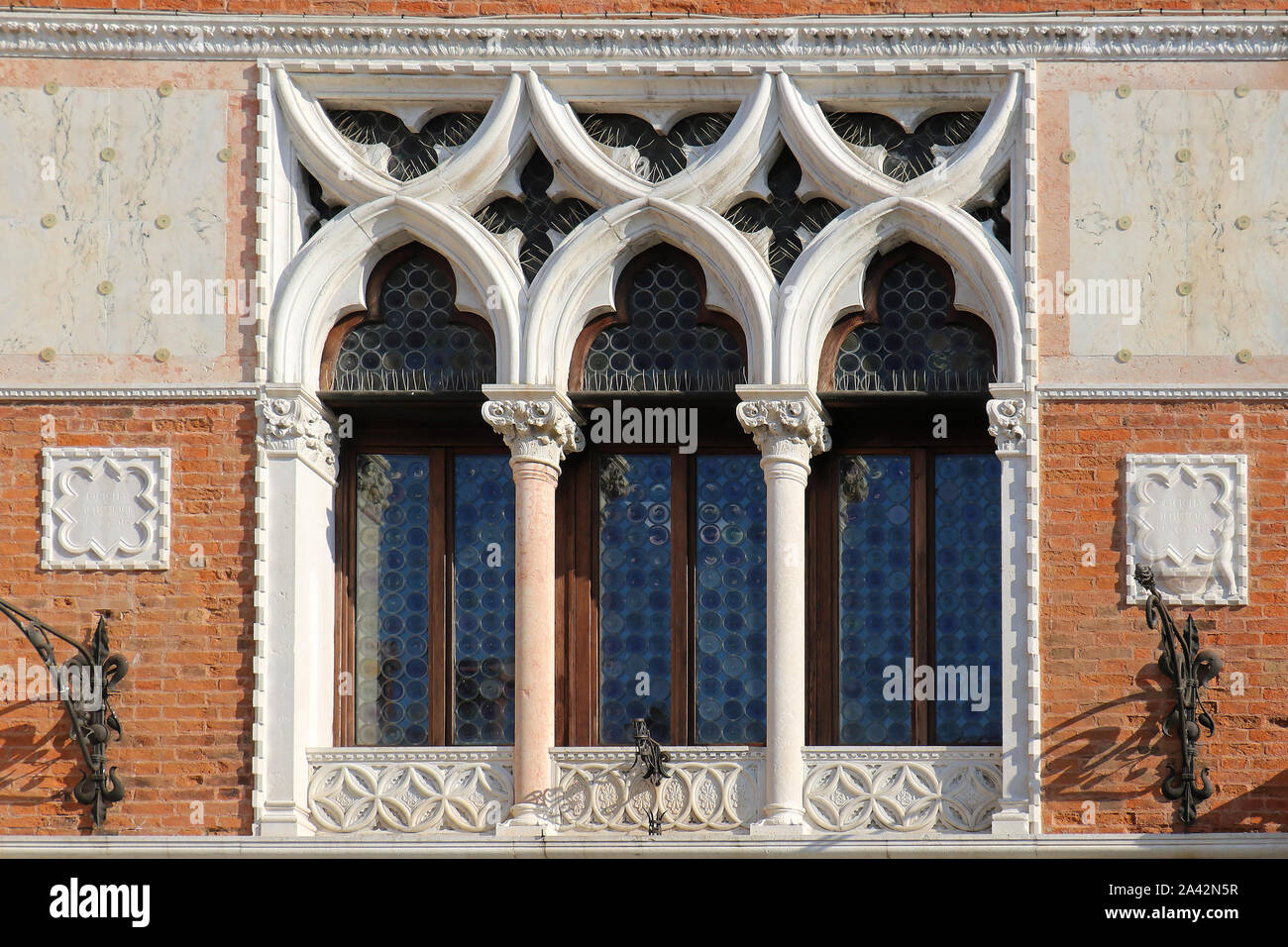 Retro window exterior with decorative stone details Stock Photo - Alamy