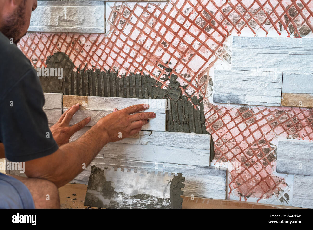 Installing wall tile hi-res stock photography and images - Alamy