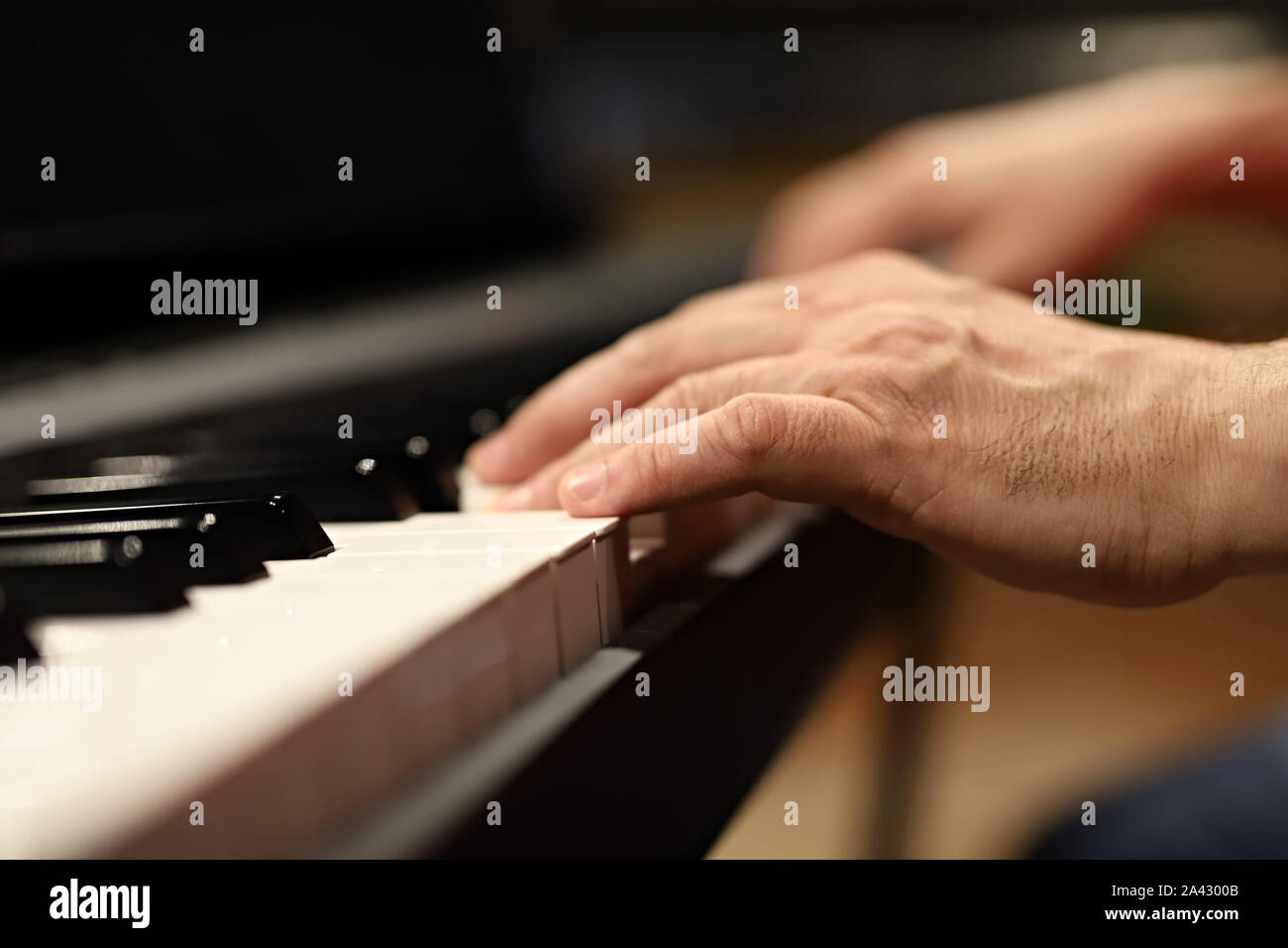 Hands playing classical piano hi-res stock photography and images - Alamy
