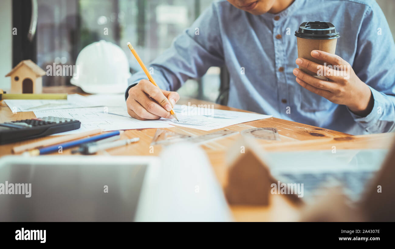 Architect or engineer working in office, Construction concept ...