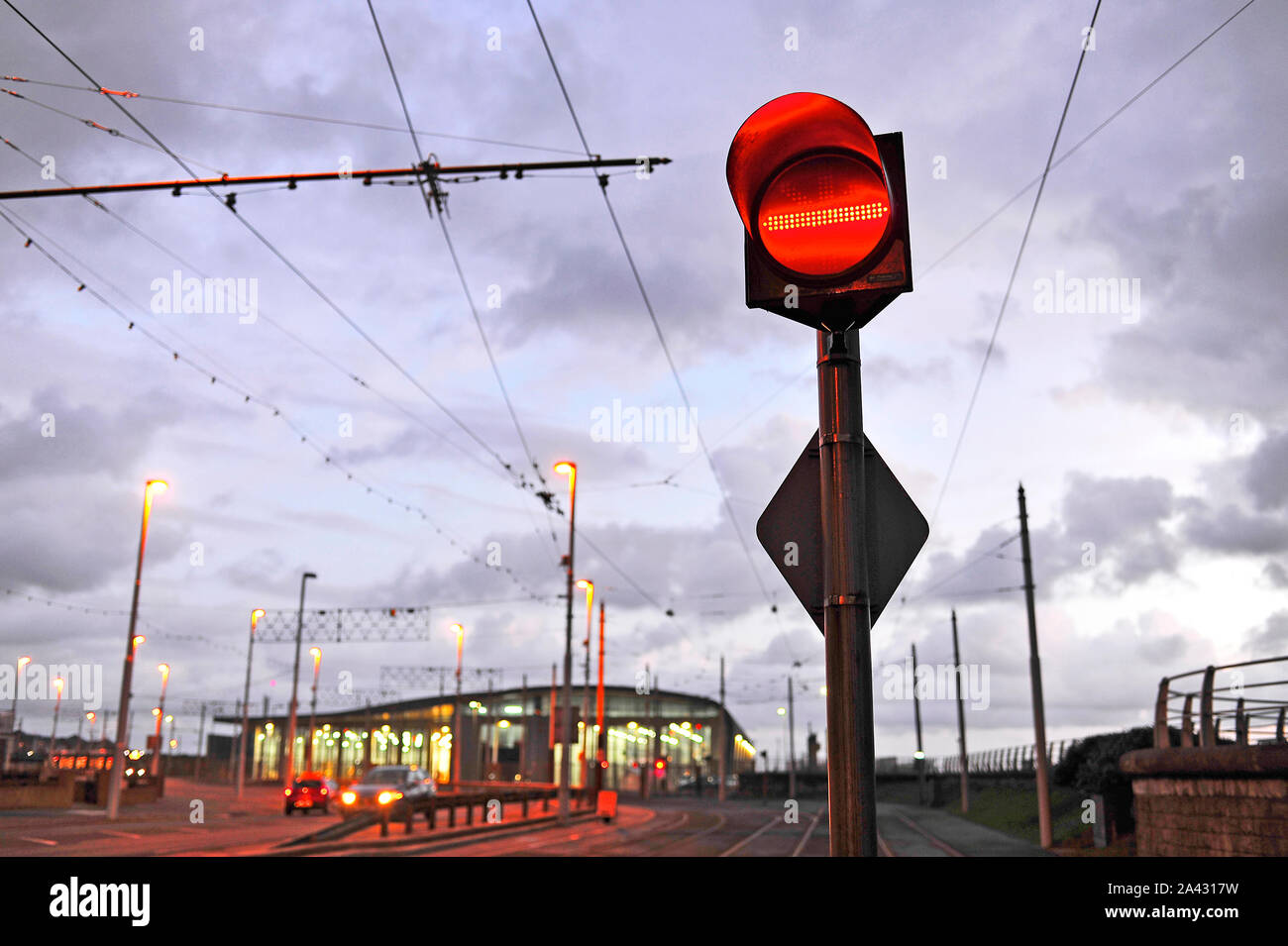 Stop signal at entrance to Blackpool Tram Depot on a rainy night in ...