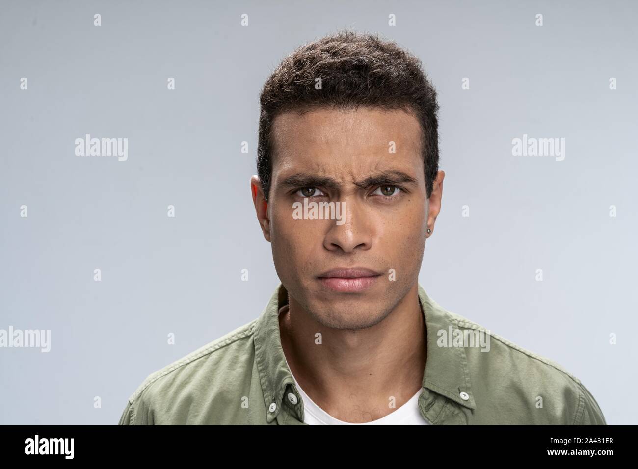 Frowning his eyebrows hi-res stock photography and images - Alamy