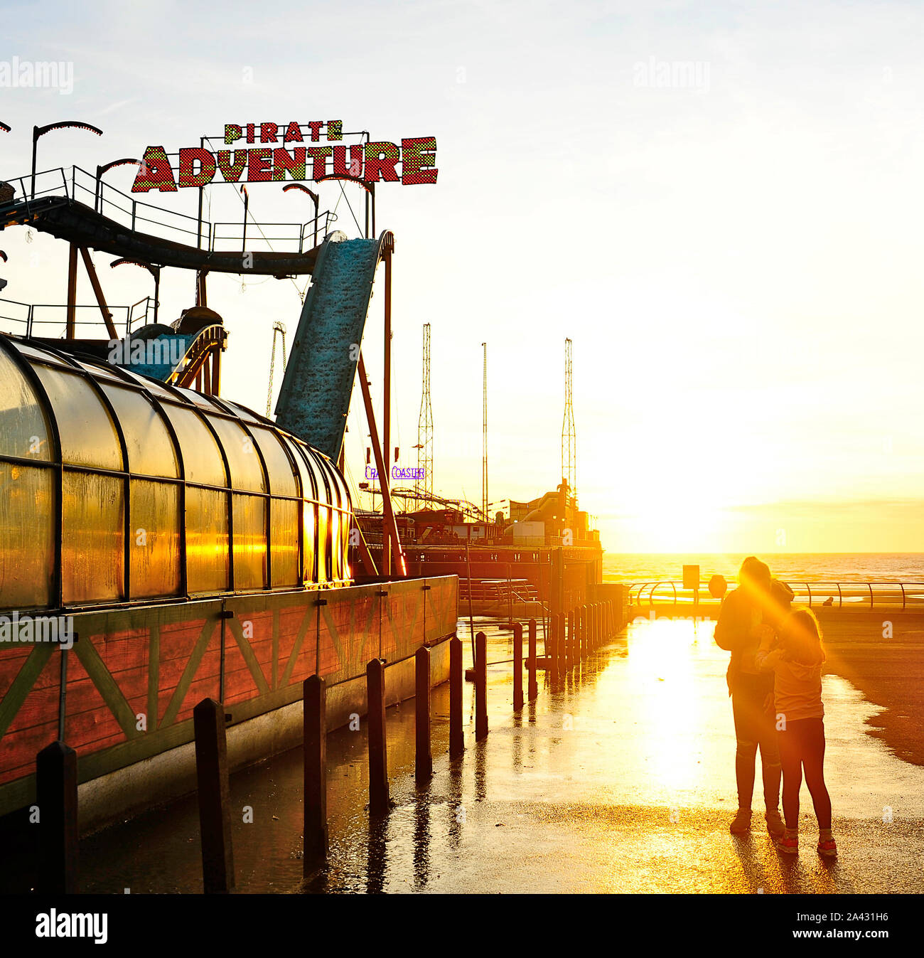 Pirate adventure log flume roller coaster at sunset Stock Photo - Alamy