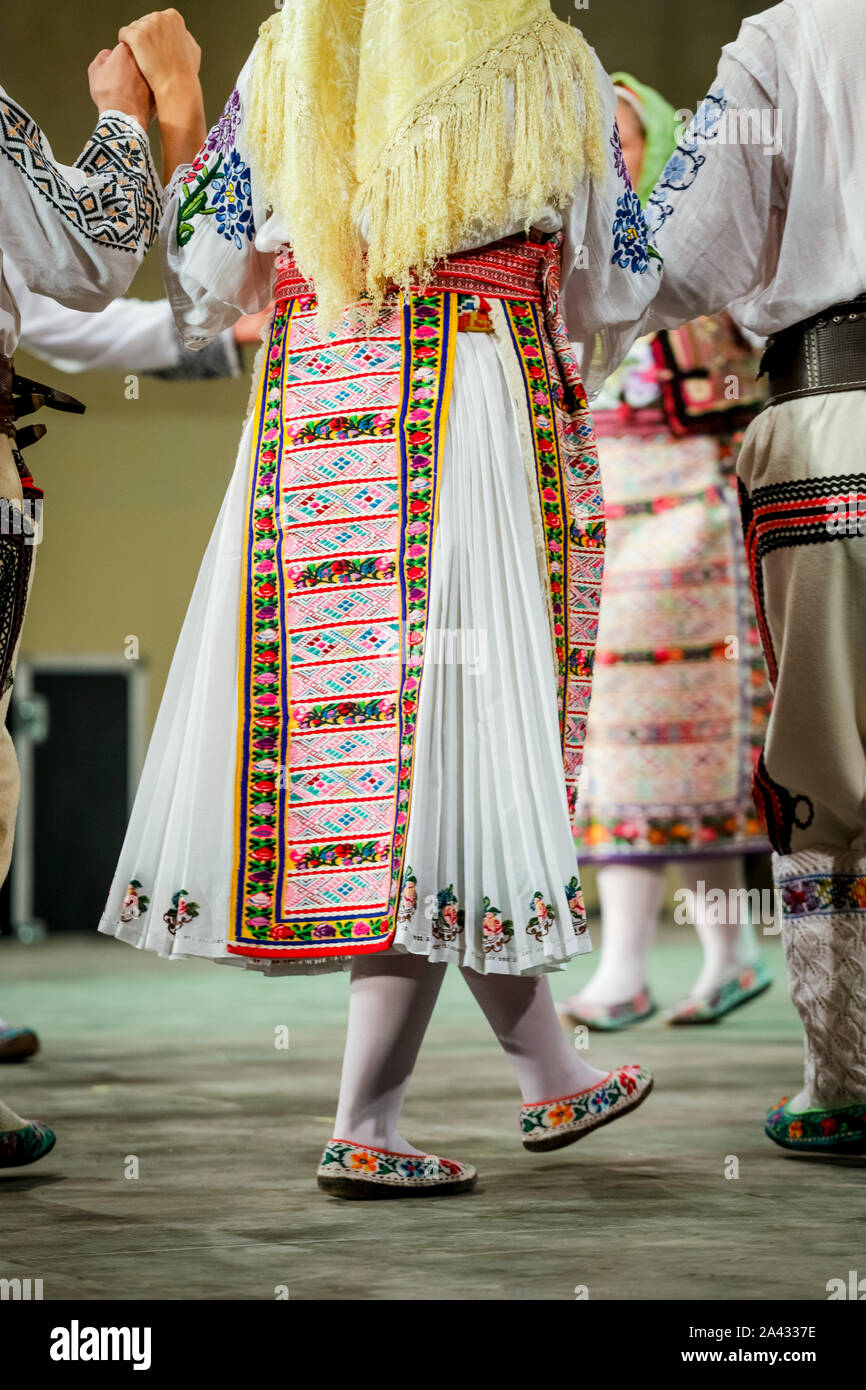 Close up of legs of young Romanian female dancer in traditional ...