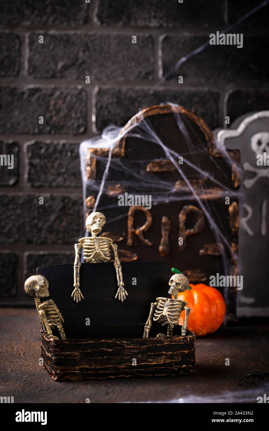 Halloween background with skeletons and tomb Stock Photo - Alamy