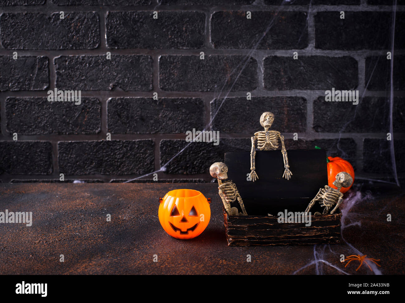 Halloween background with skeletons and tomb Stock Photo - Alamy