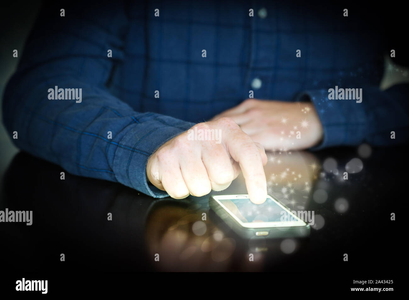 Mobile phone, using a touch screen, sparks around the phone Stock Photo ...