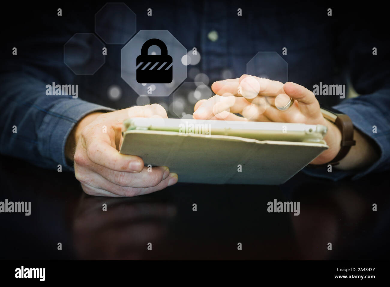 using a tablet - tablet security with sparks coming from the screen ...