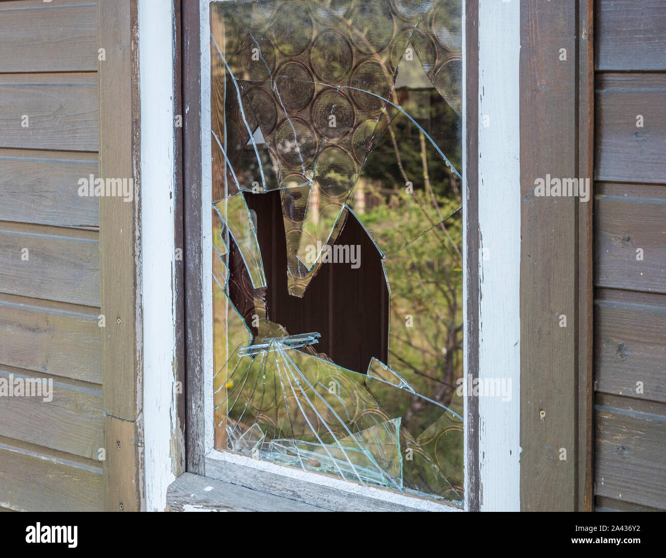 Burglary window pane vandalism Stock Photo - Alamy