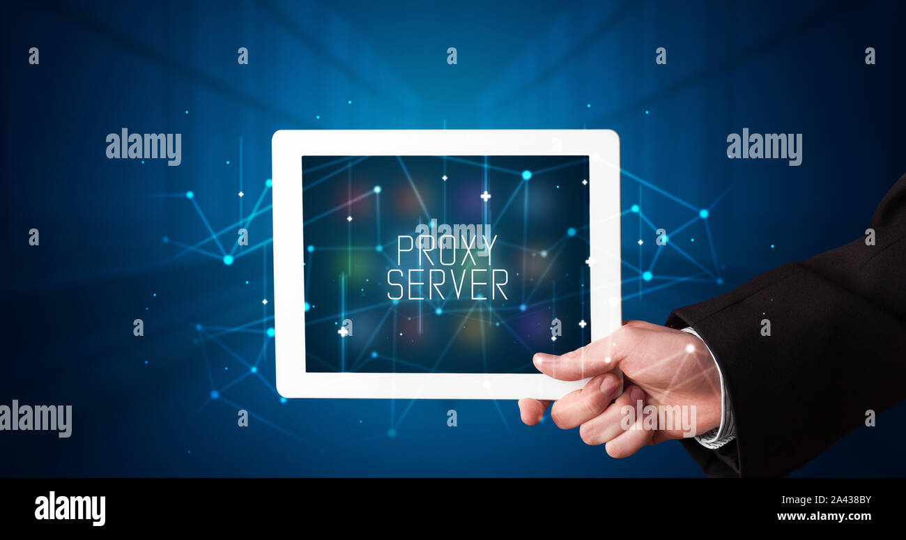 Young business person working on tablet and shows the digital sign ...