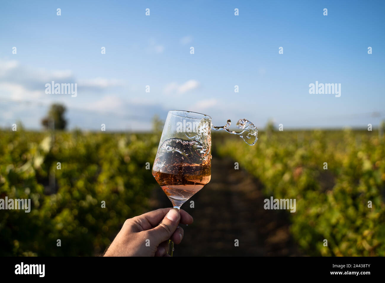 perspective point of view closeup of Caucasian male hand agitating and ...