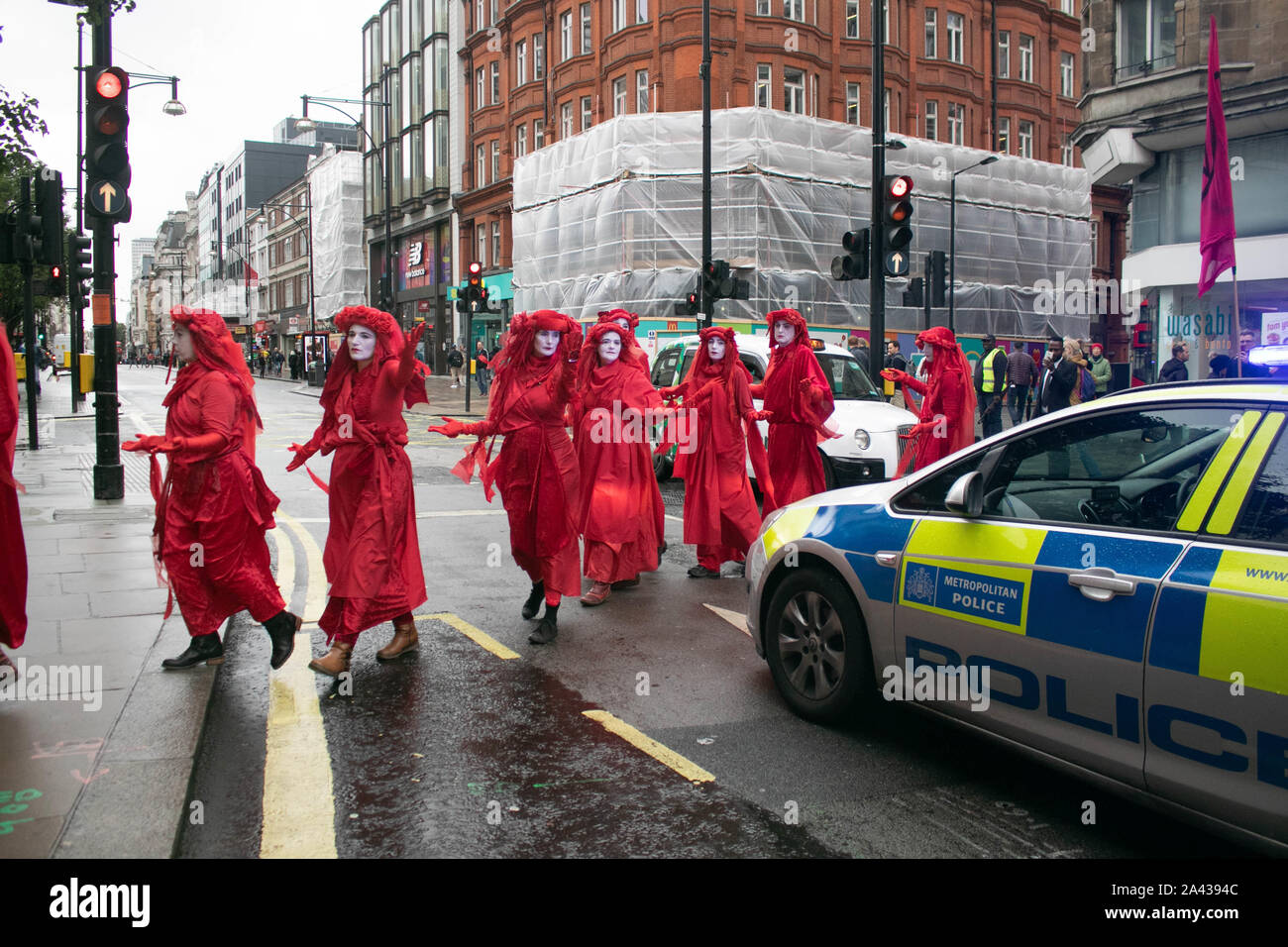 London, UK - 11 October 2019. The Red Rebel Brigade from Extinction ...