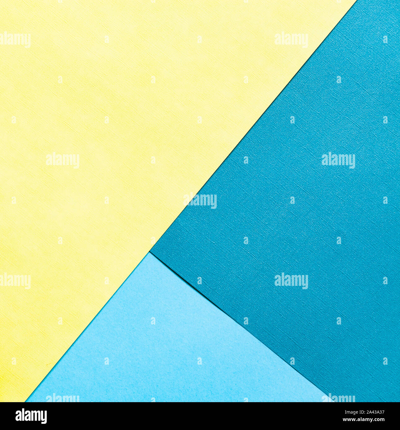 paper background of light colors yellow and blue Stock Photo - Alamy