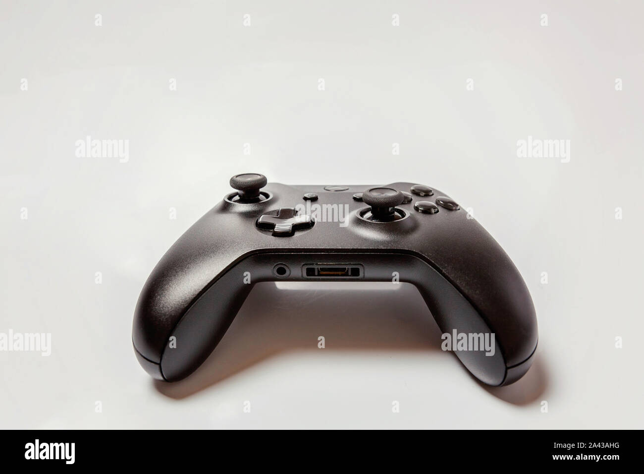 Black joystick gamepad, game console isolated on white background. Computer gaming technology ...