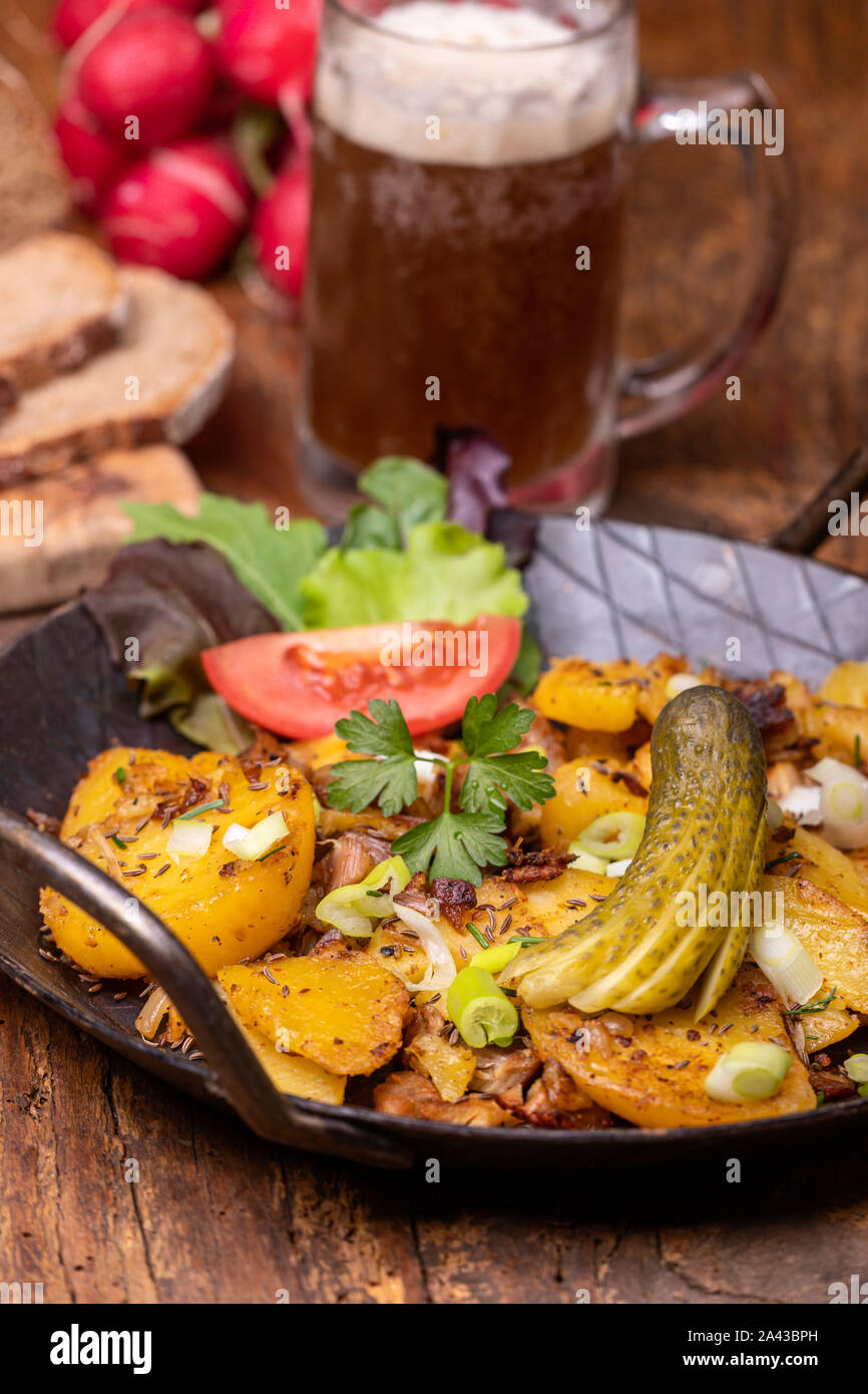 rustic tyrolean groestl on wood Stock Photo - Alamy