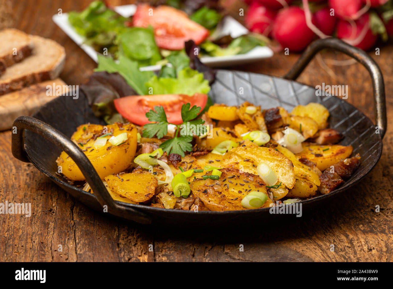 rustic tyrolean groestl on wood Stock Photo - Alamy