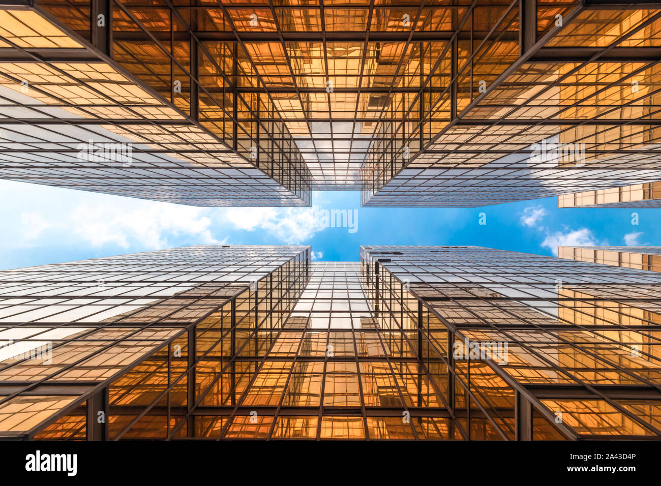 Gold colour office building tower facade in business center Stock Photo ...