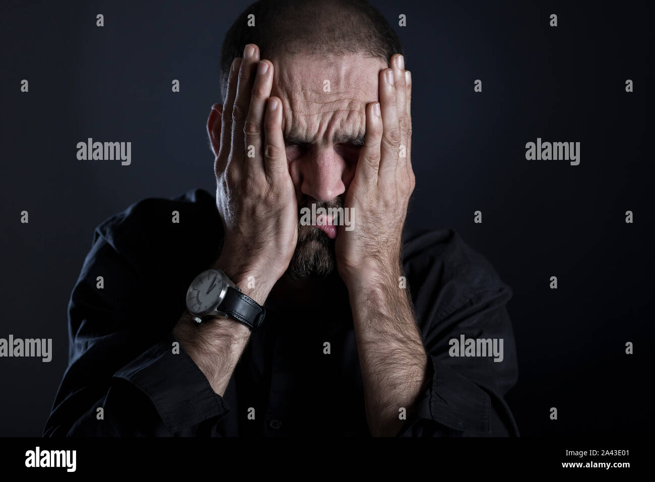Man covering face dark hi-res stock photography and images - Alamy
