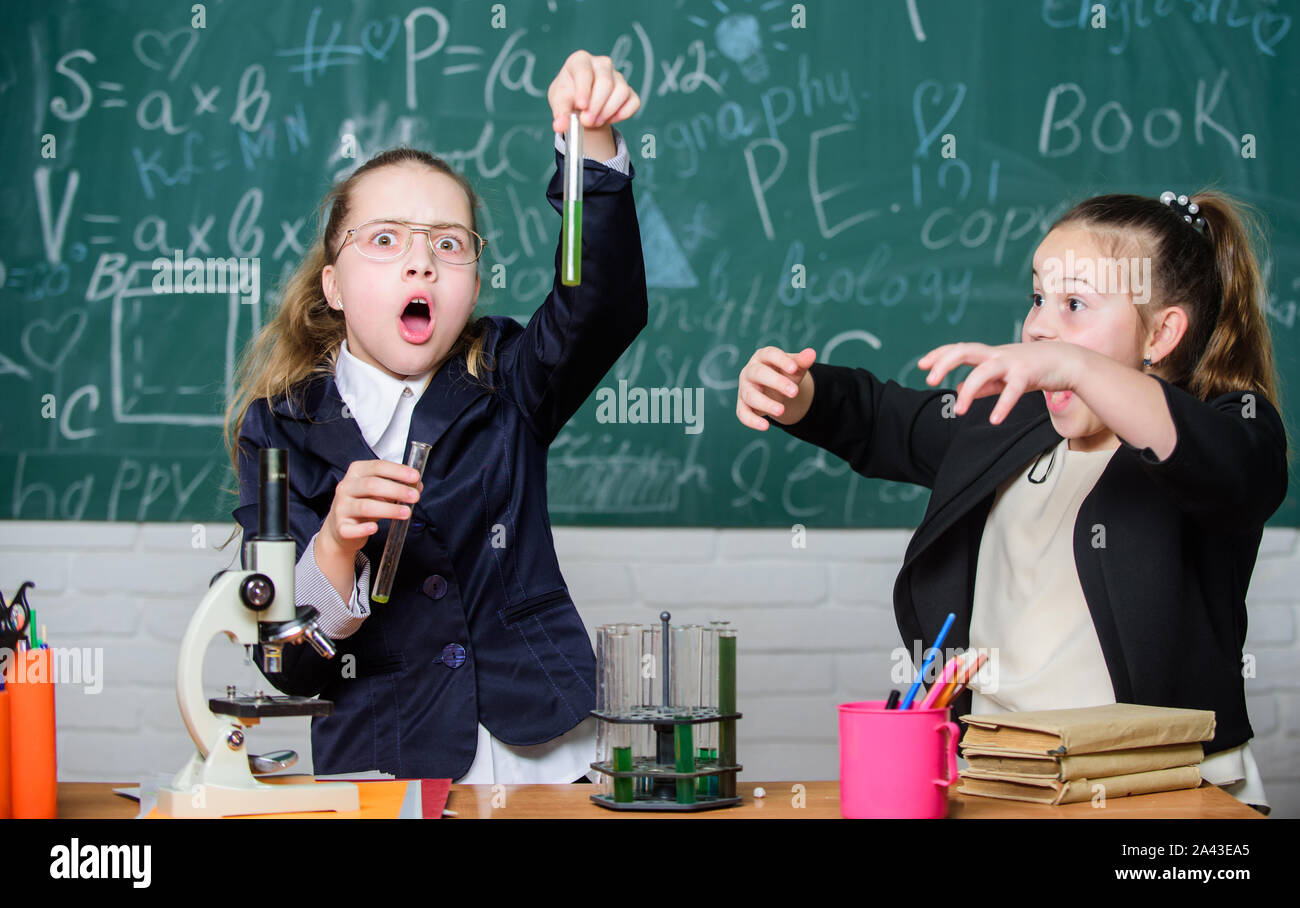 Educational experiment concept. Be careful performing chemical reaction ...