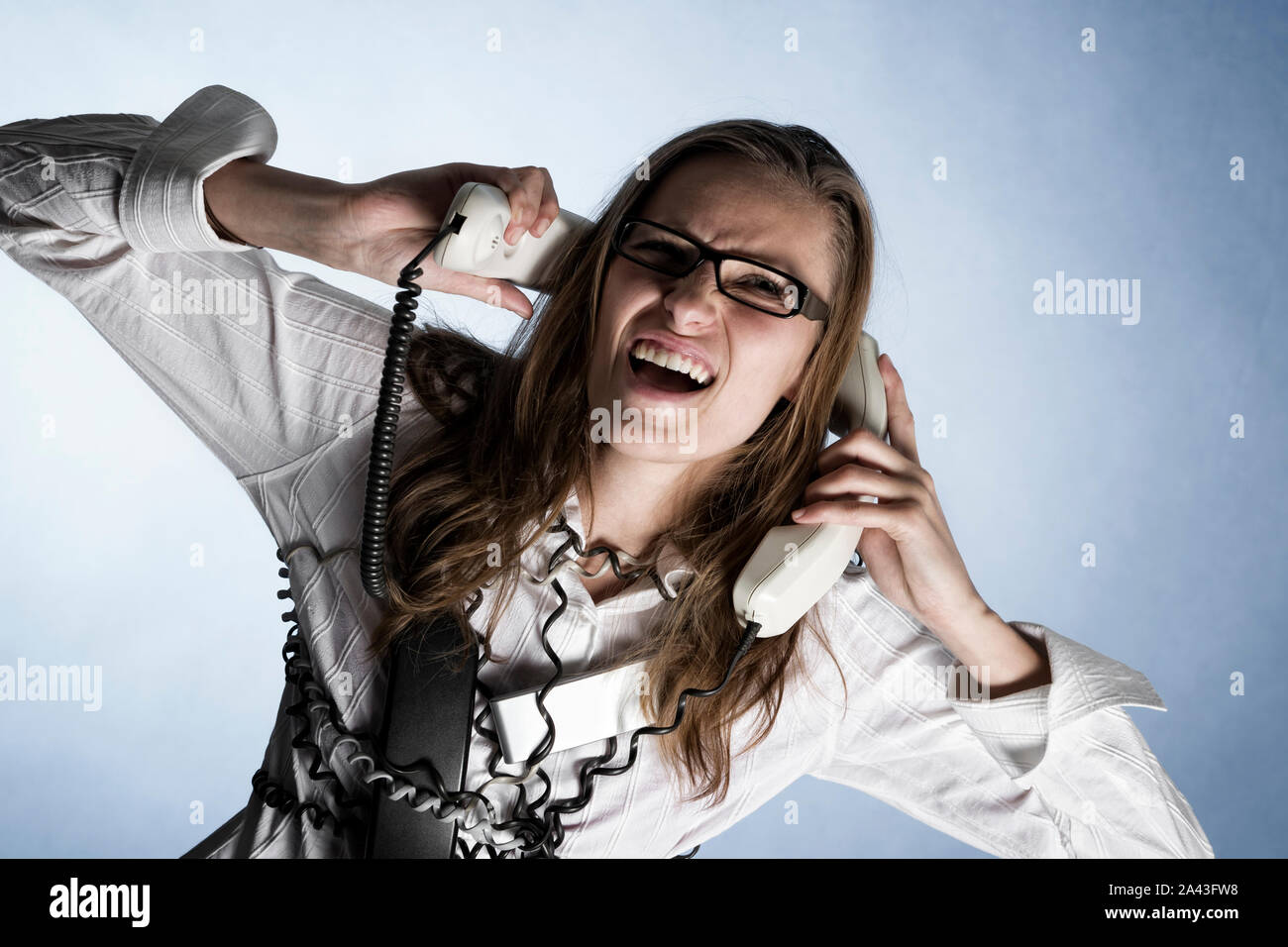 Screaming phone operator Stock Photo - Alamy