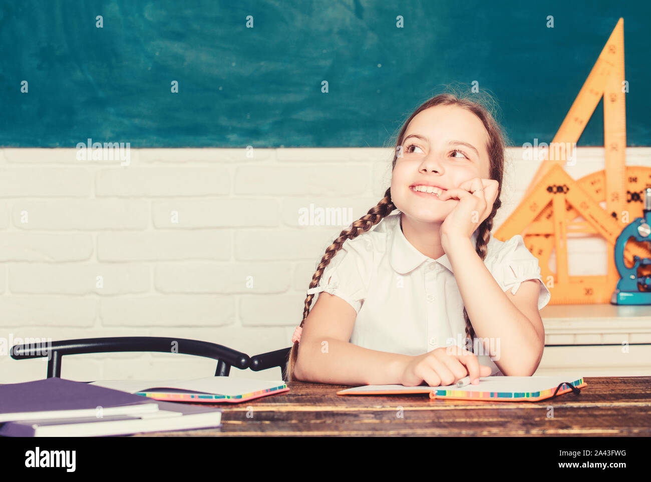 Hello small student girl hi-res stock photography and images - Alamy