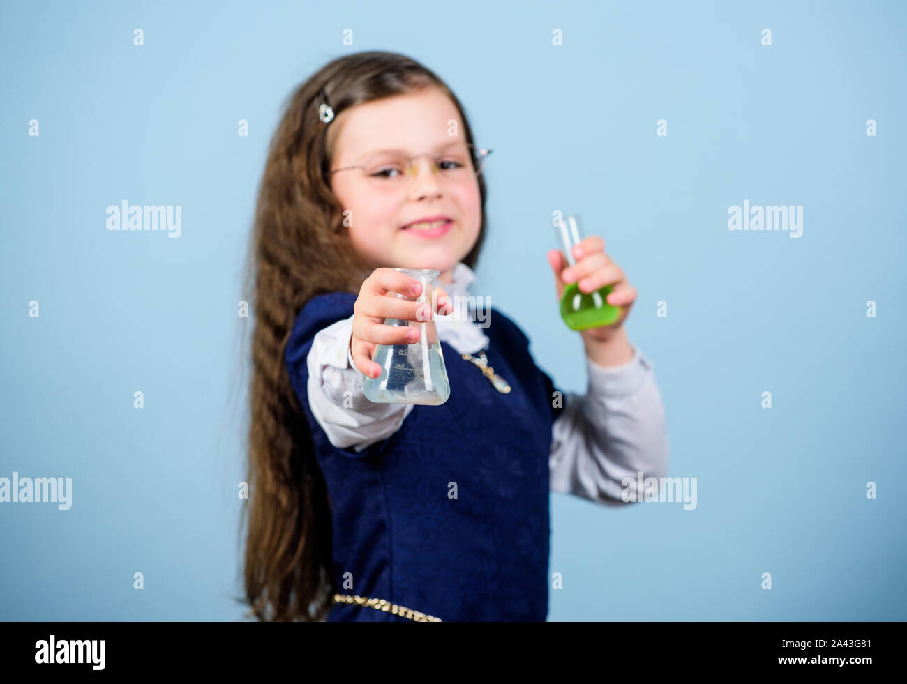 Girl school nerd. Scientific experiment. Chemical analysis. Chemistry ...