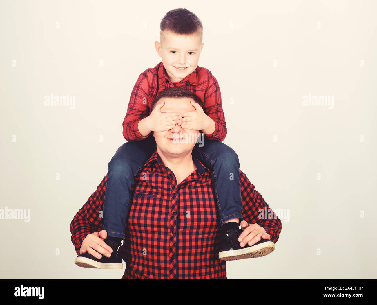 Best friends forever. Dad piggybacking adorable child. Having fun ...