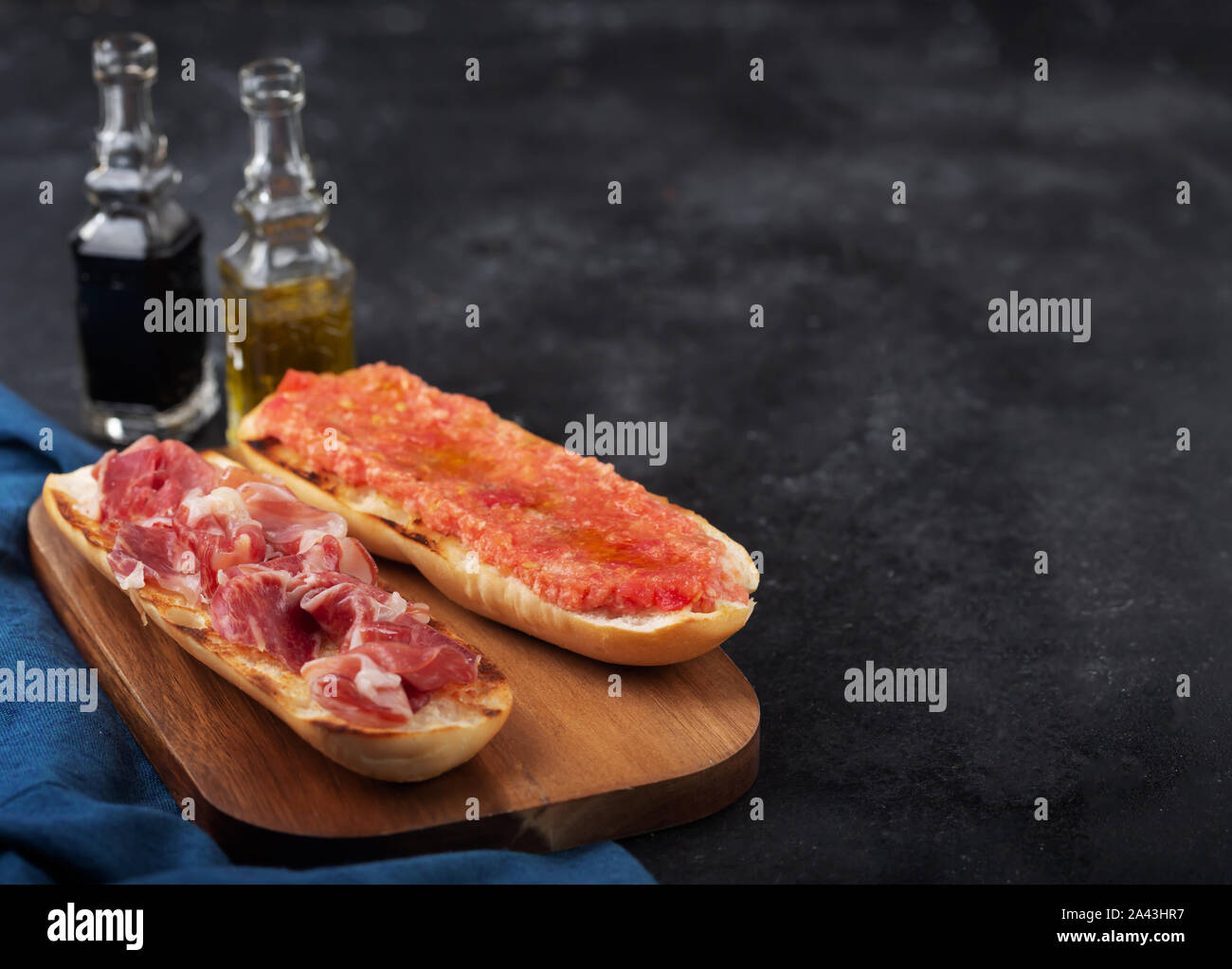 Spanish tomato and ham toast, traditional breakfast or lunch Stock ...