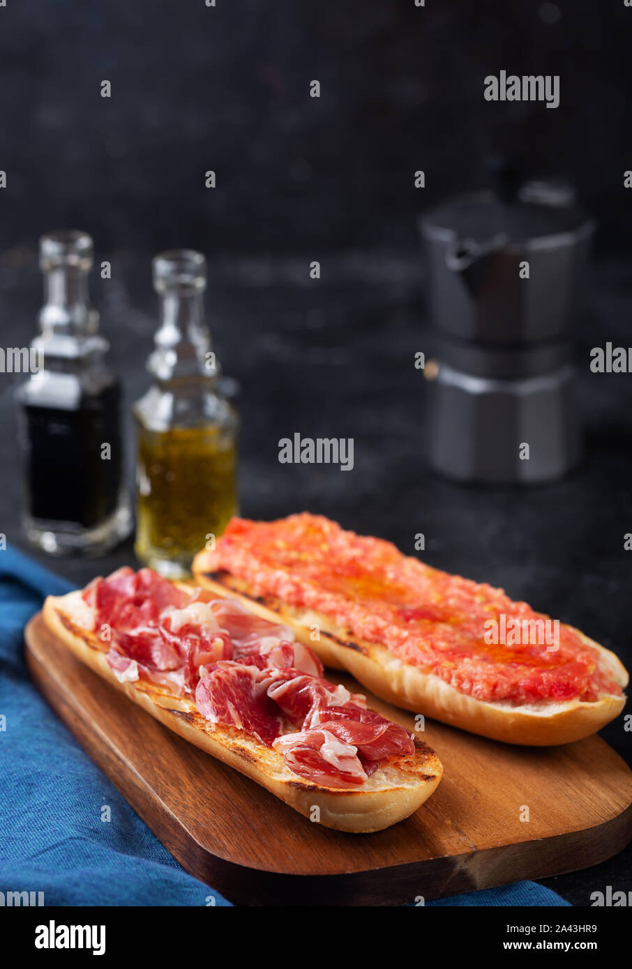 Spanish tomato and ham toast, traditional breakfast or lunch Stock ...