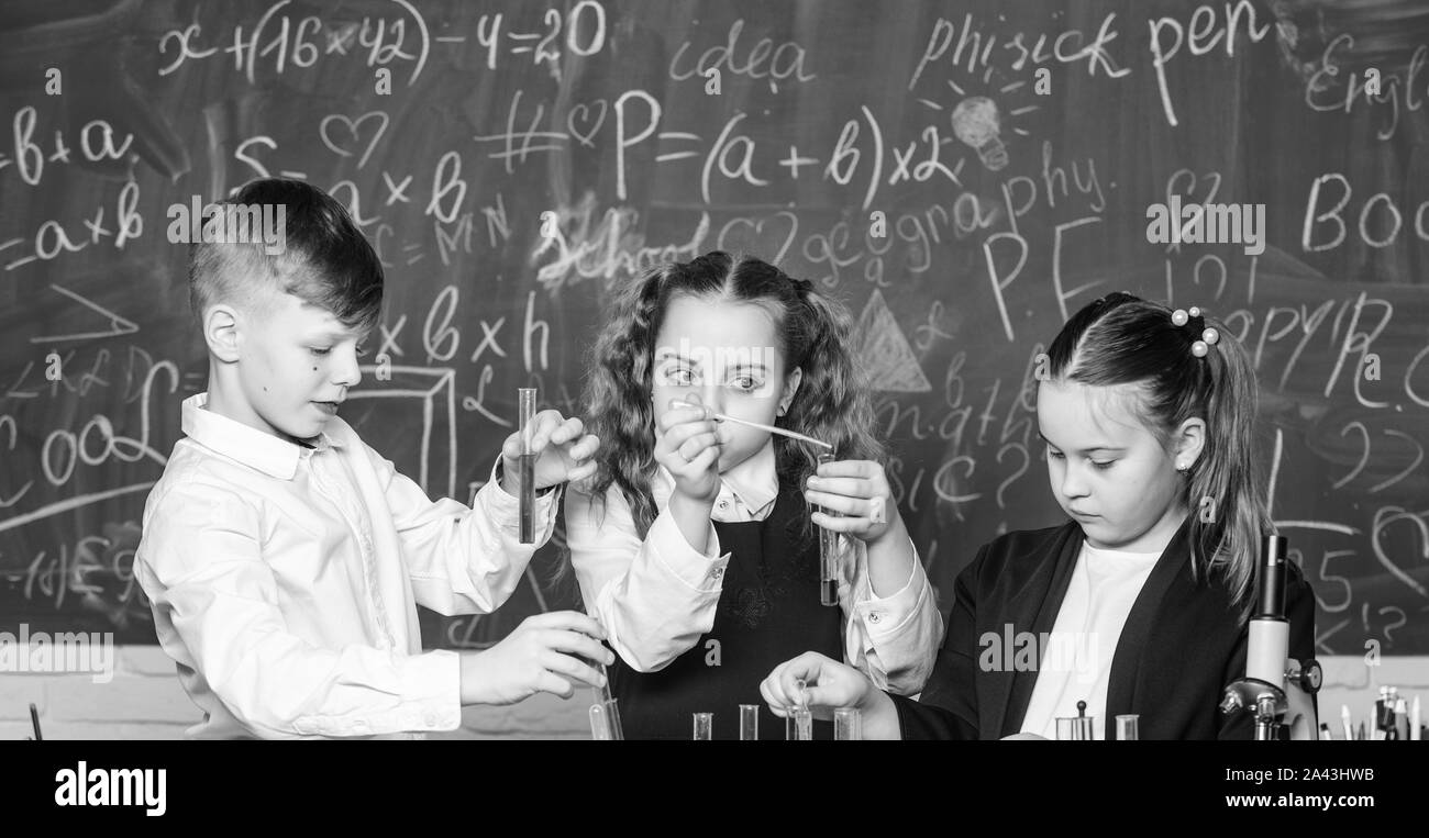 science is we. Little kids scientist earning chemistry in school lab ...