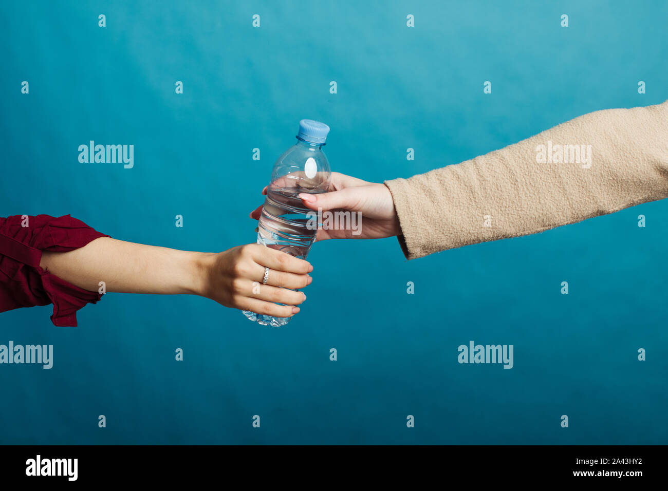 Hand transfers water to the other hand. Health Stock Photo - Alamy
