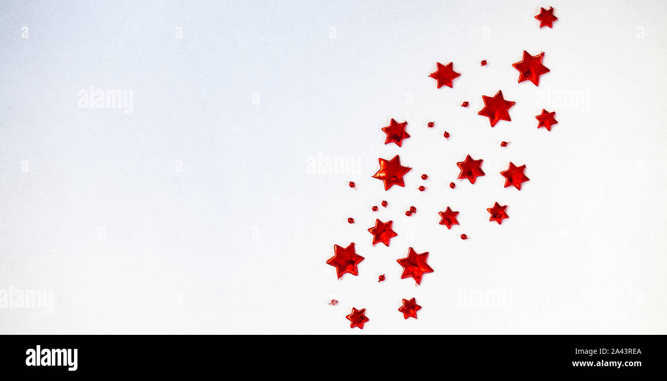 christmas background of red stars on a white background Stock Photo - Alamy