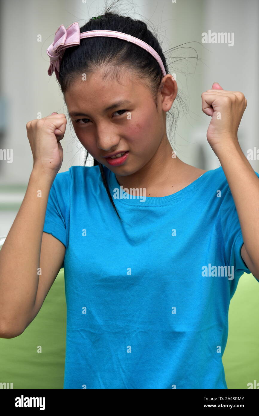 Mad Pretty Minority Girl Stock Photo - Alamy