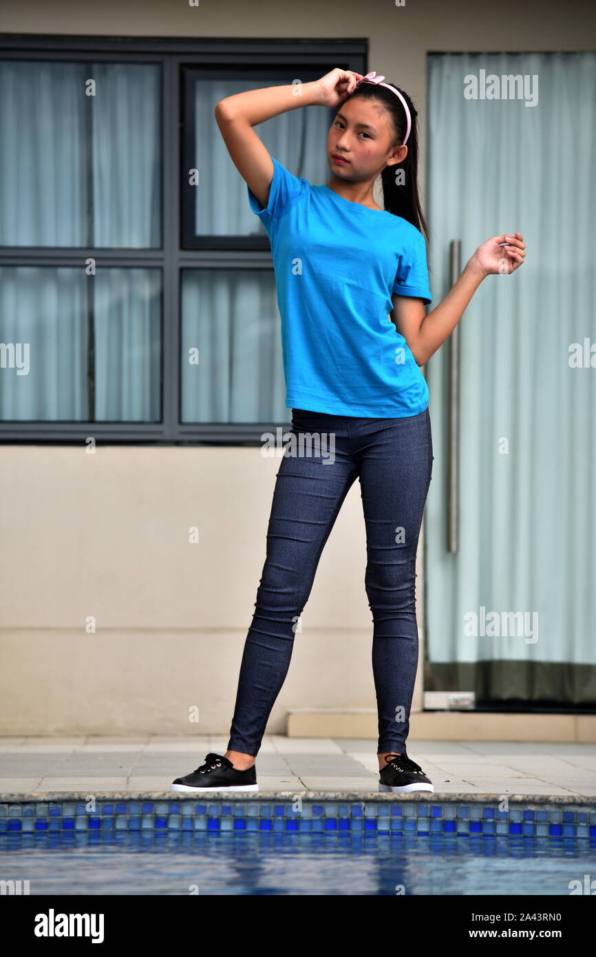 Posing Pretty Girl Standing Stock Photo - Alamy