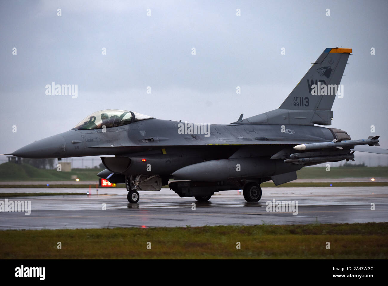 A U.S. Air Force 80th Fighter Squadron pilot taxis in an F-16 Fighting ...