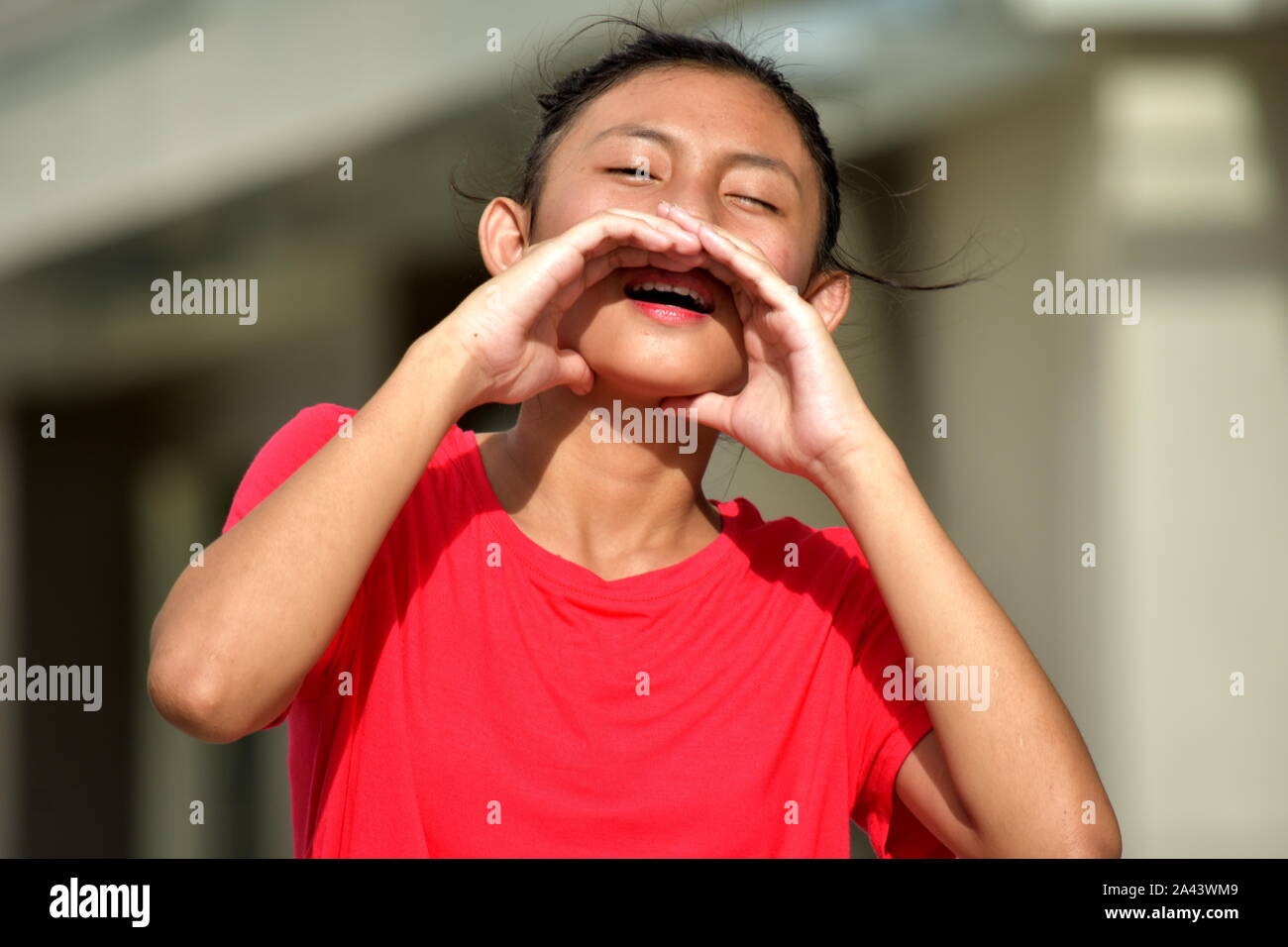 Shouting Cute Filipina Female Stock Photo - Alamy