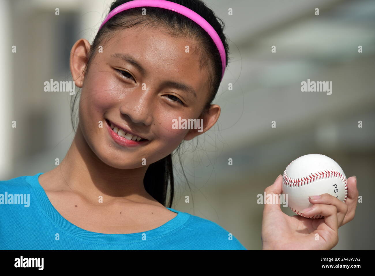Female Athlete And Happiness With Baseball Stock Photo - Alamy