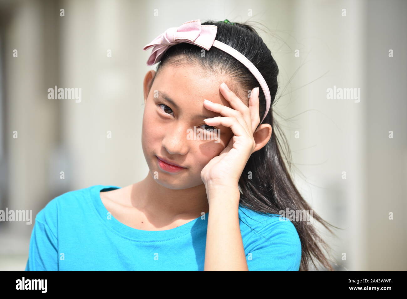 Worrisome Beautiful Minority Female Stock Photo - Alamy